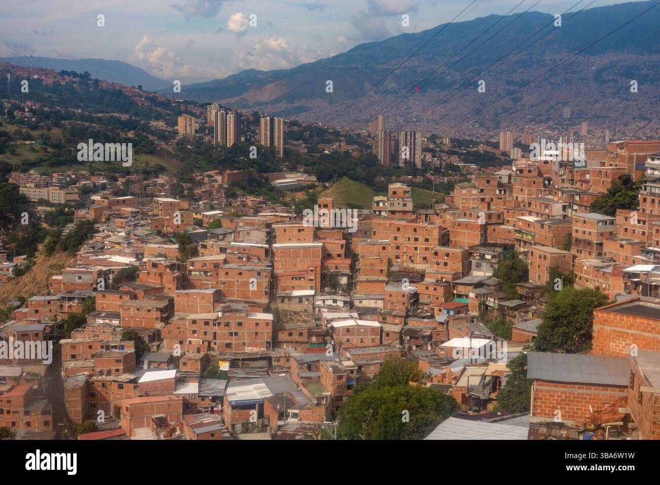 View of the hillside slums of El Moro, Comuna 13, from Santa Margarita ...