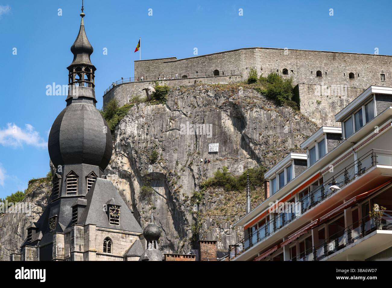 Jeff Roba pictured hanging from the cliff face of the Dinant citadel to ...