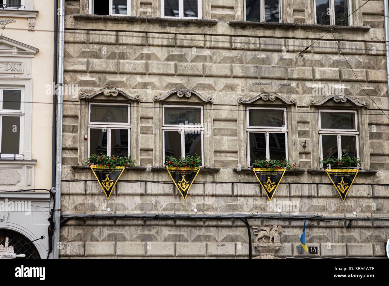 Lviv, Ukraine - May 04, 2025: Stone facade of a traditional building ...