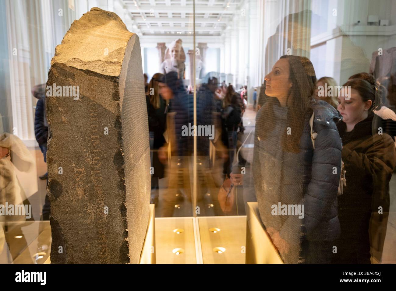 Visitors viewing and takng pictures of the Rosetta Stone at the British ...
