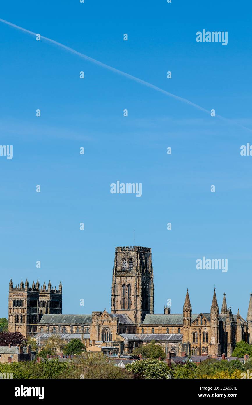Durham Cathedral stands tall against a clear blue sky, a historic ...