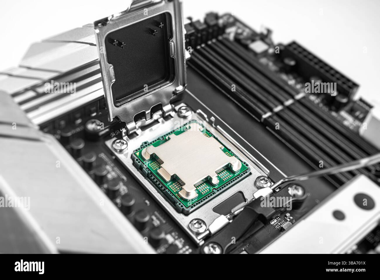 A central processing unit is securely seated in a motherboard socket ...