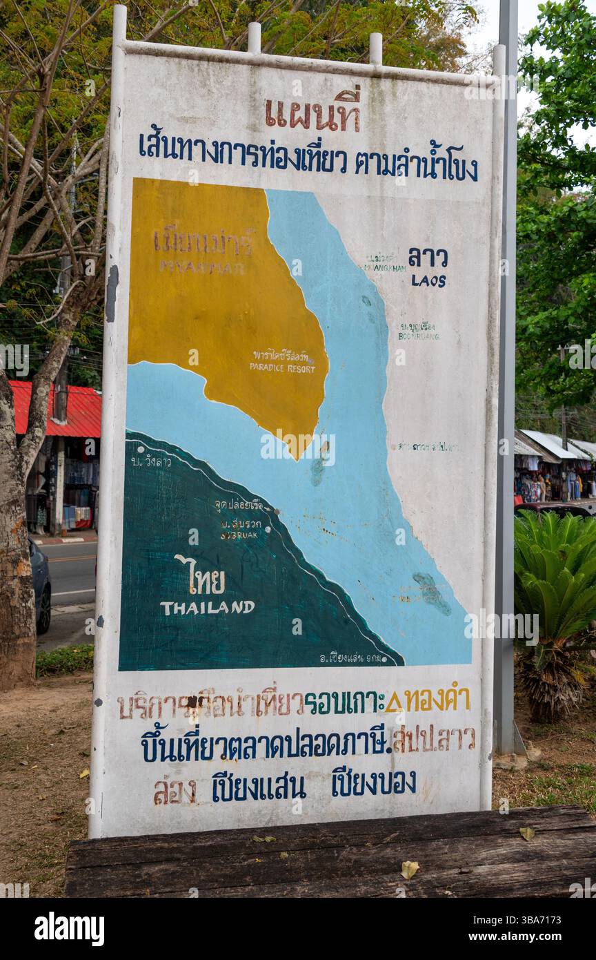 A painted street sign showing where all three nations meet across the ...