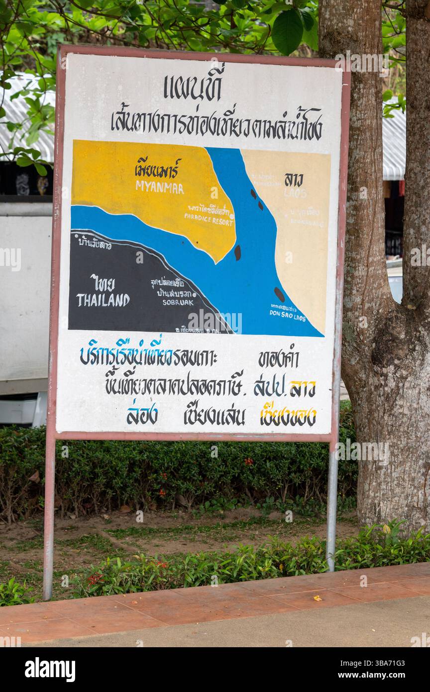 A painted street sign showing where all three nations meet across the ...