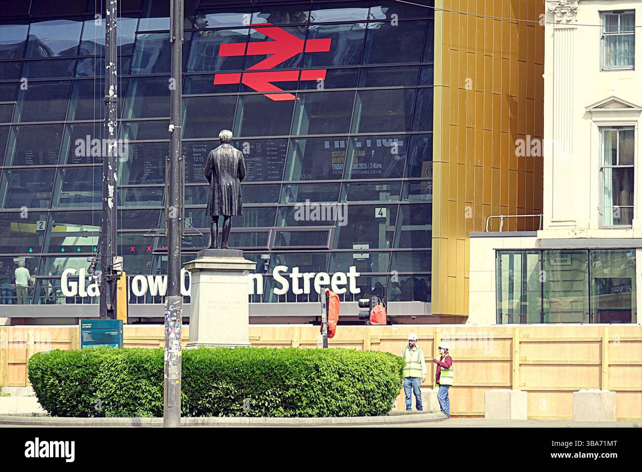 Glasgow, Scotland, UK. 12th May, 2025. Rabbie Burns statue hoisted ...