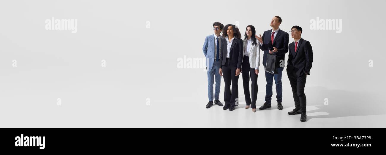 Confident businessmen in suits pose, embodying business professionalism ...