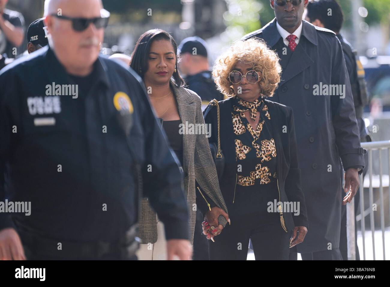 Janice Combs, mother of Sean "Diddy" Combs, second from right, arrives ...