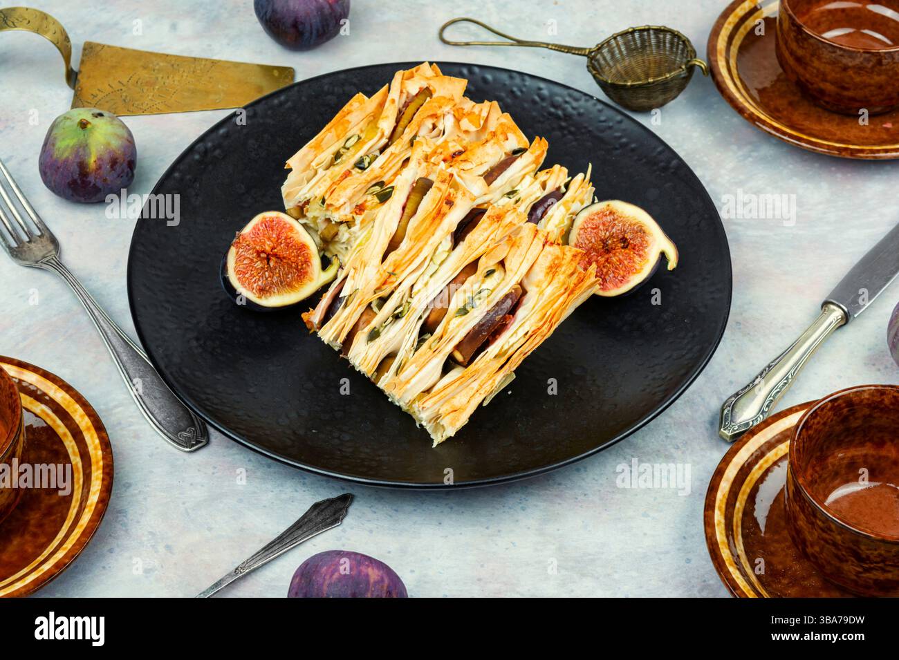 Homemade filo pastry pie with ripe figs and brie cheese Stock Photo - Alamy