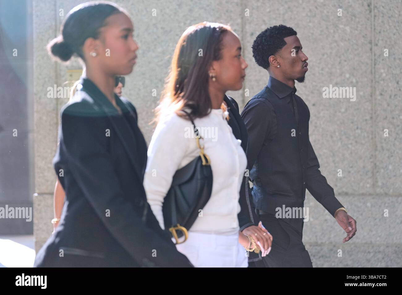 King Combs, right, son of Sean "Diddy" Combs, and other family members ...