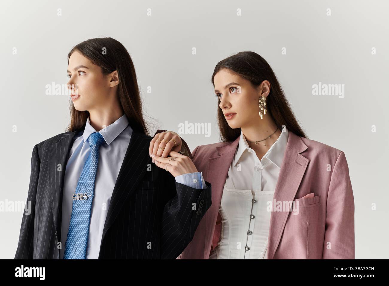Stylish twin sisters pose hi-res stock photography and images - Alamy