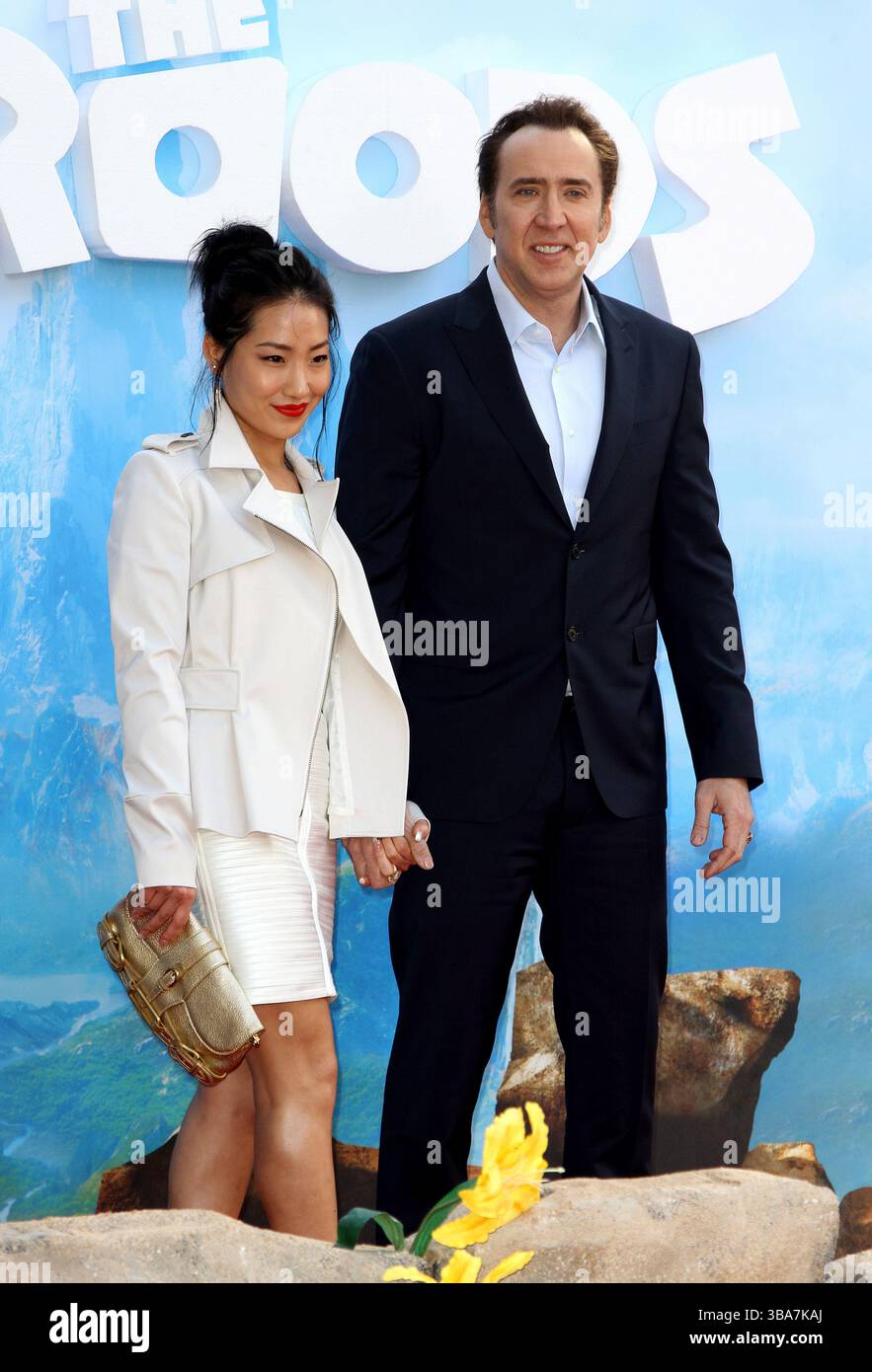 Alice Kim and Nicolas Cage at the premiere of 'The Croods' in New York ...