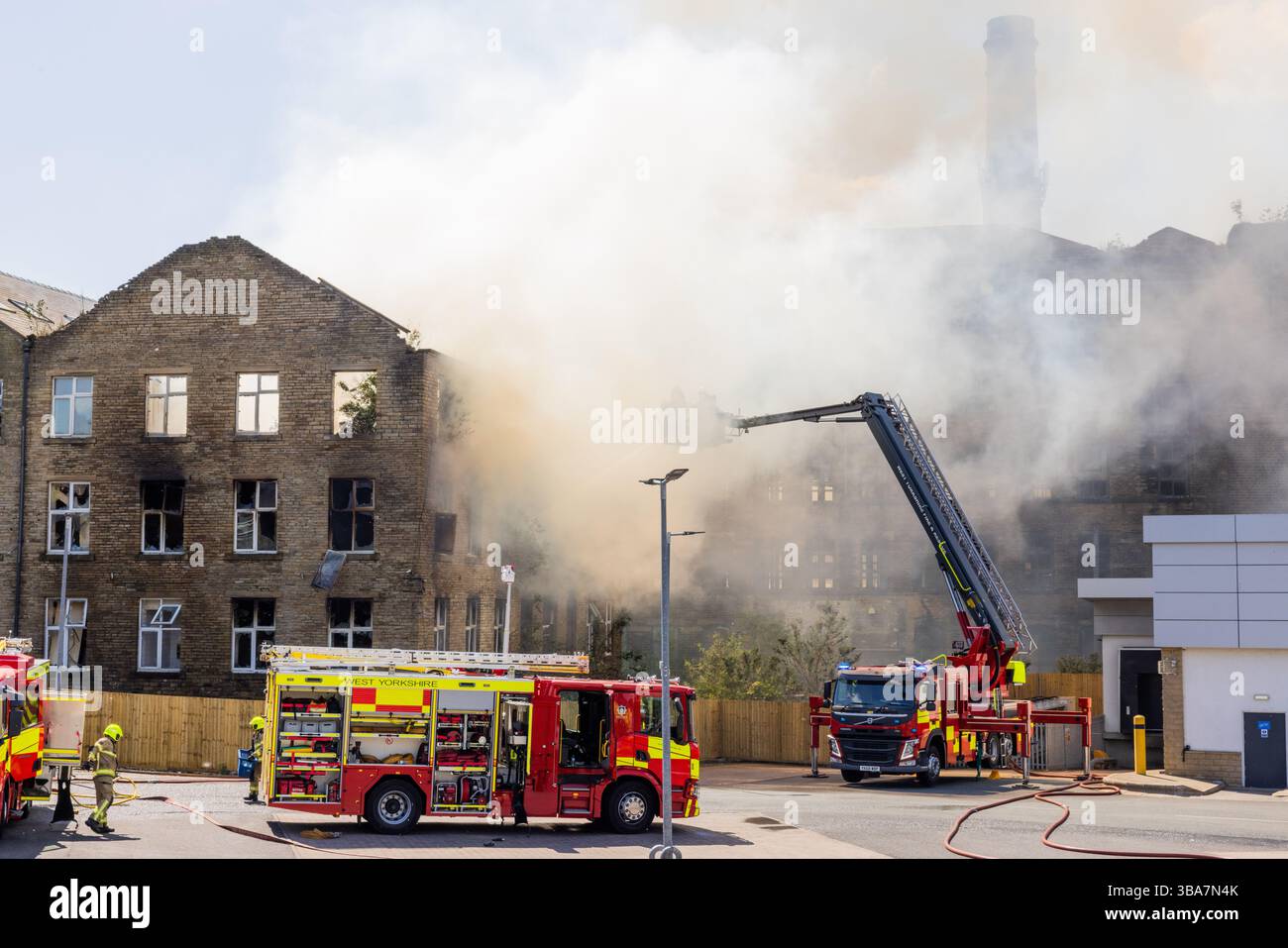 Bradford, UK. 12 MAY, 2025. Fire continues to burn at abandoned ...