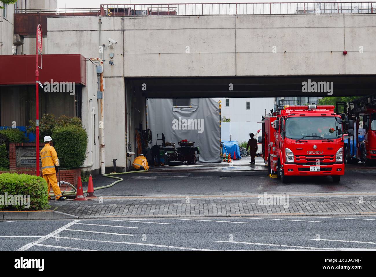 TOKYO, JAPAN - May 10, 2025: Detail of the front of a ‏fire station in ...