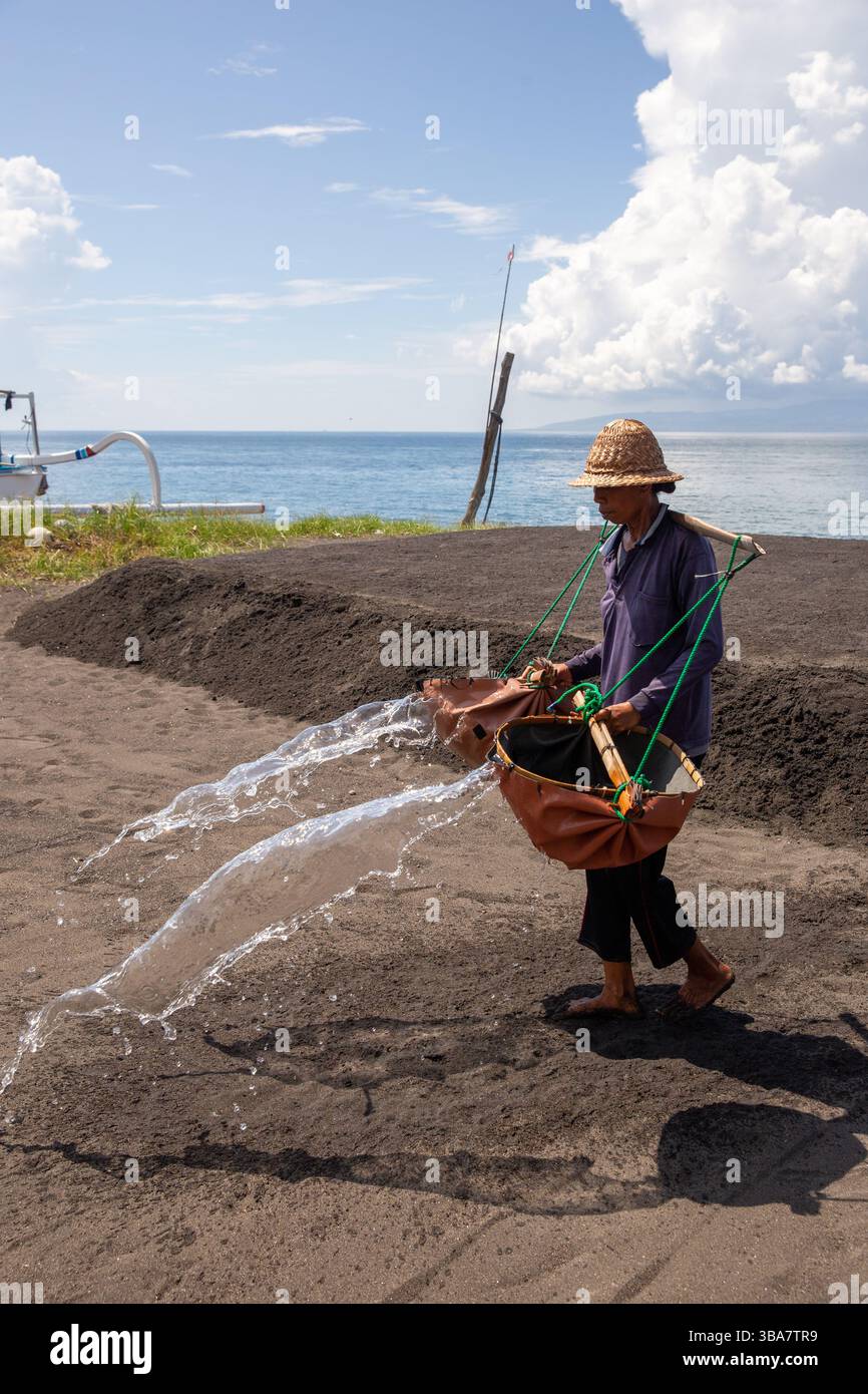 Indonesian Black Volcano Salt Making in the Kusamba Village Stock Photo ...