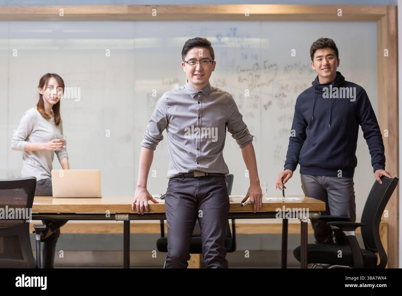 Chinese business team in board room Stock Photo - Alamy