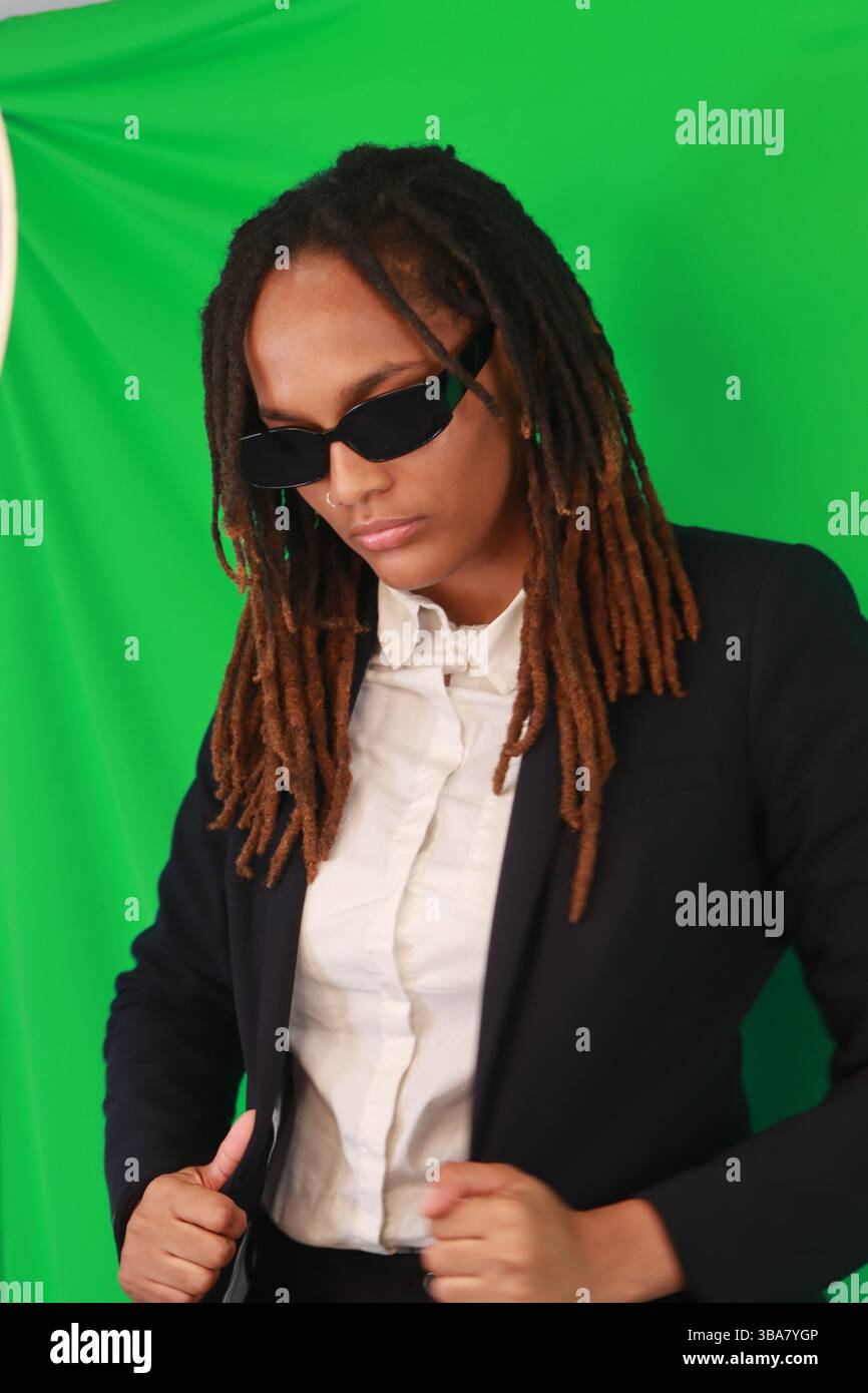 Black woman of Afro-Caribbean descent with dreadlocks and sunglasses ...