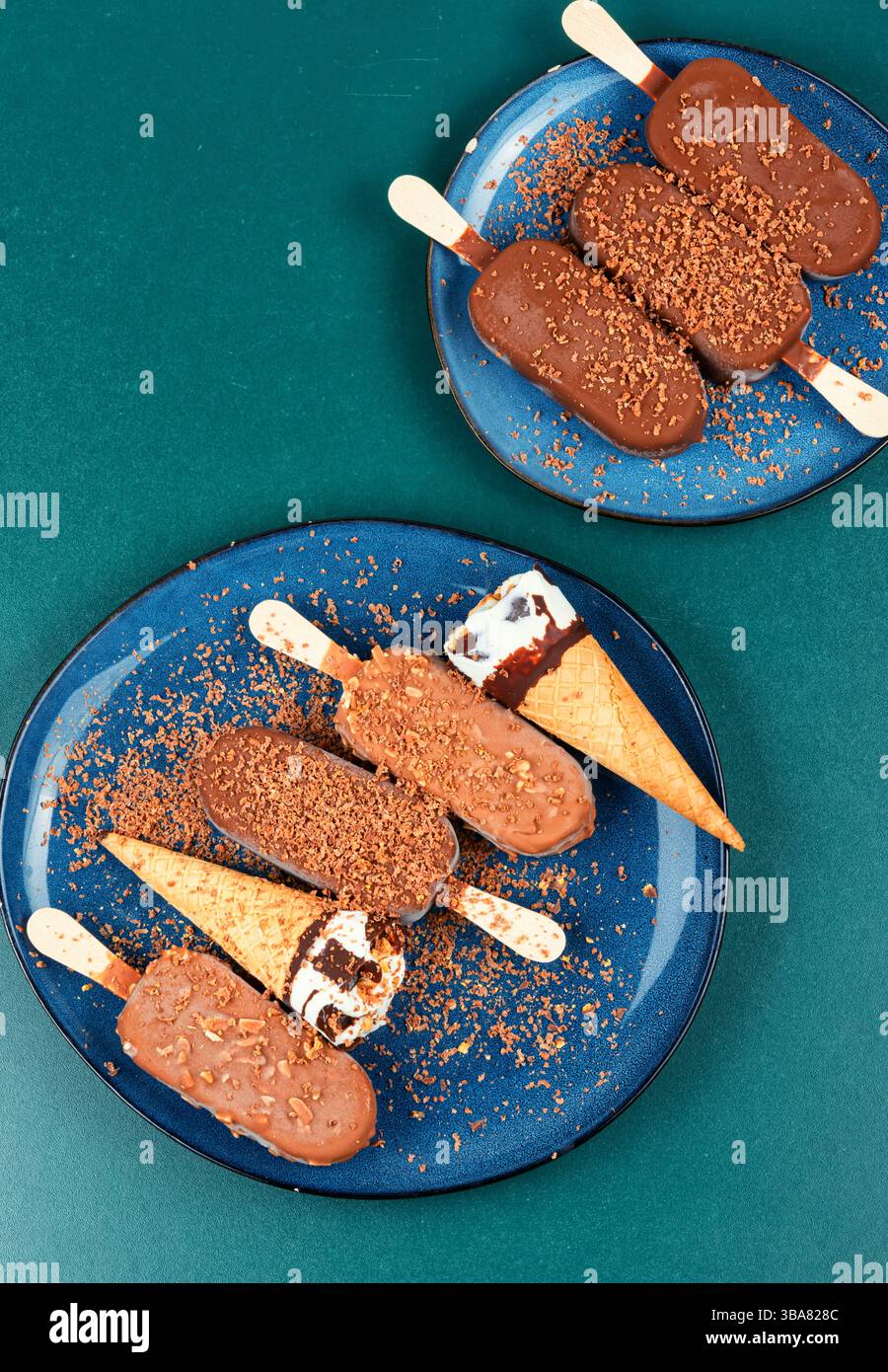 Chocolate ice cream bars on a stick. Refreshing summer food. Top view ...