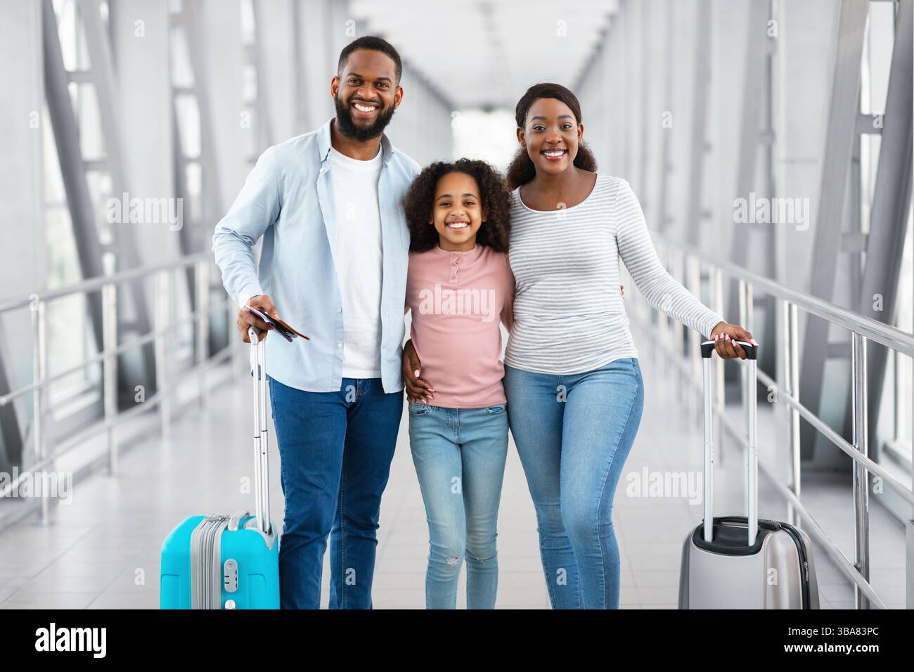 Portrait Of Cheerful African American Family Of Three People Hugging ...