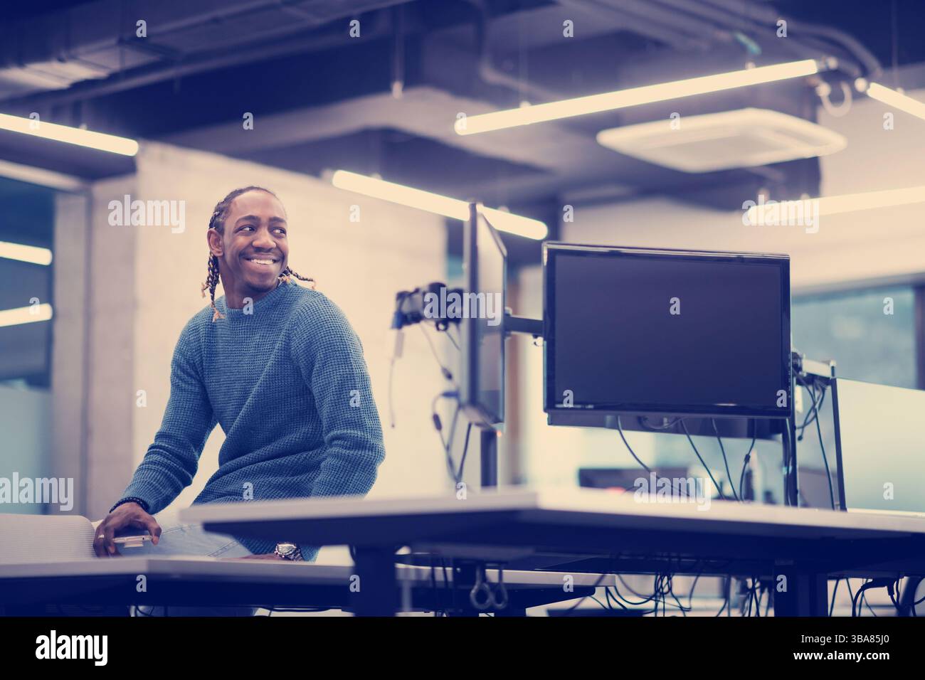 Portrait of young smiling african american male software developer ...