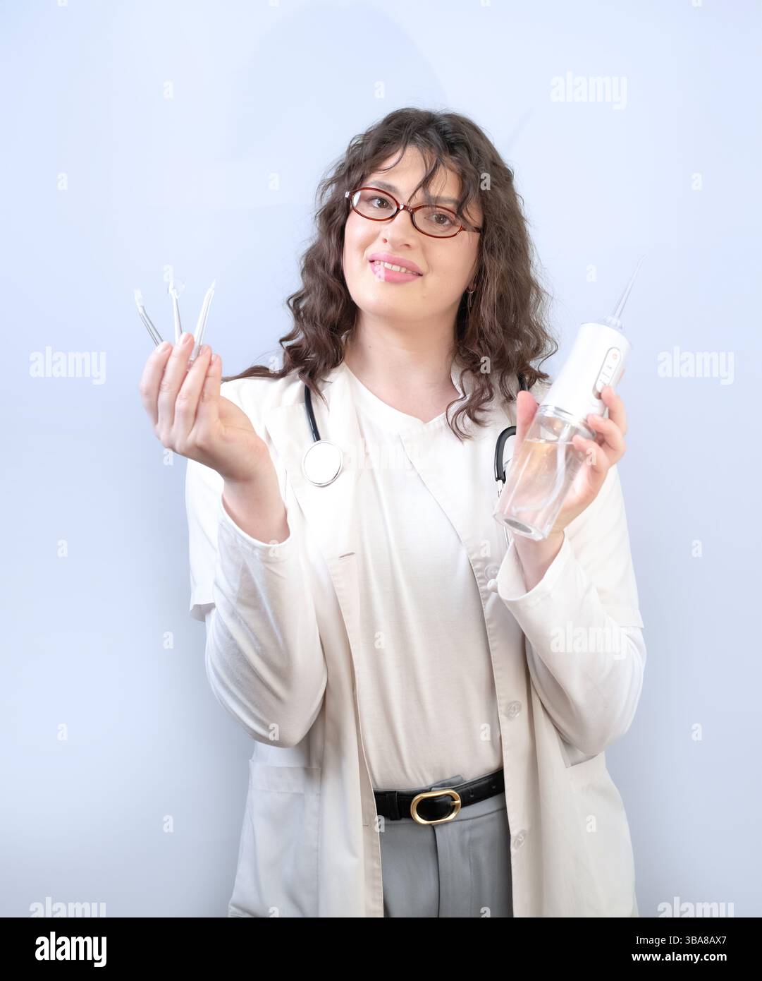 Dentist shows how to easily and safely use a water flosser at home for ...