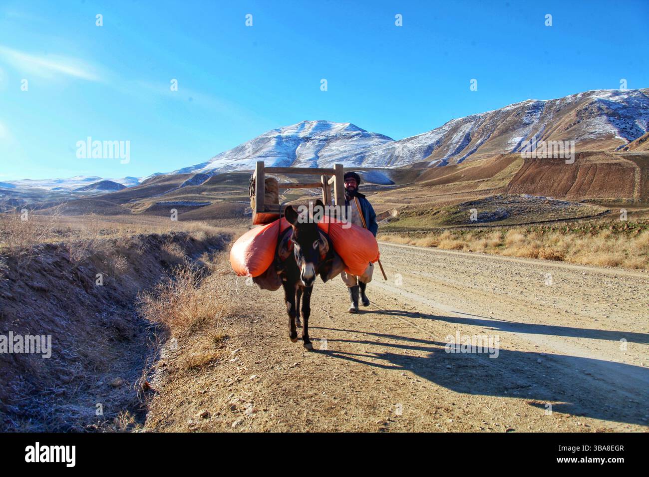 An Afghan Man Walking Stock Photo - Alamy