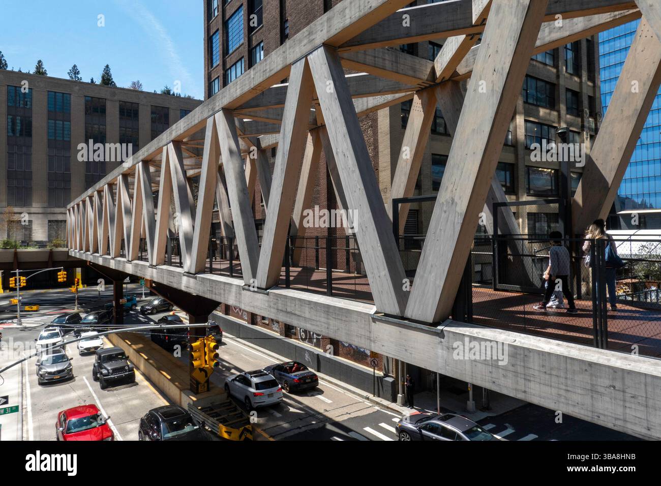 The Timber Bridge is a composite wooden bridge located in Hudson Yards ...