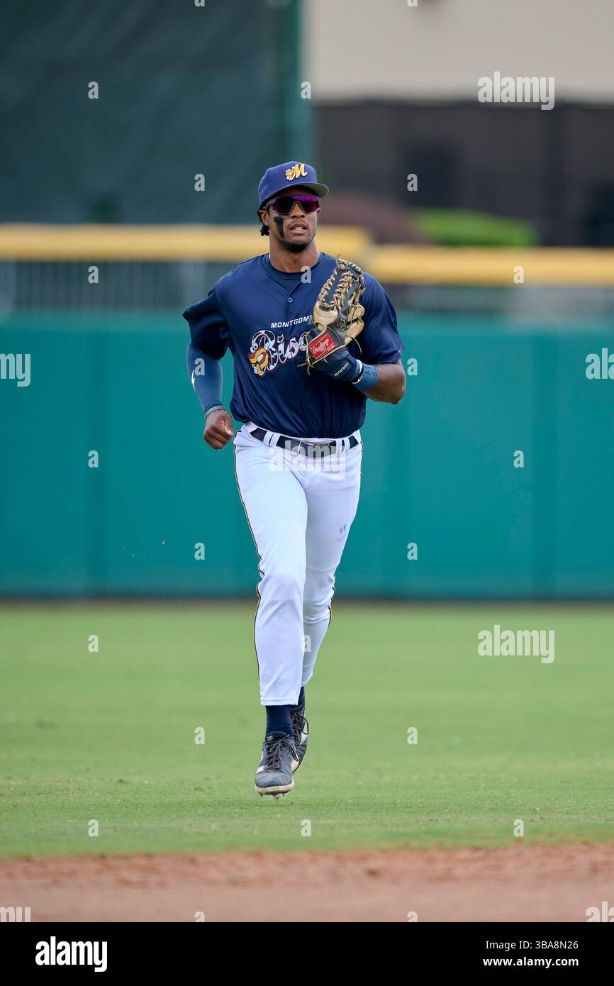 Montgomery Biscuits outfielder Homer Bush Jr. (35) jogs to the dugout ...