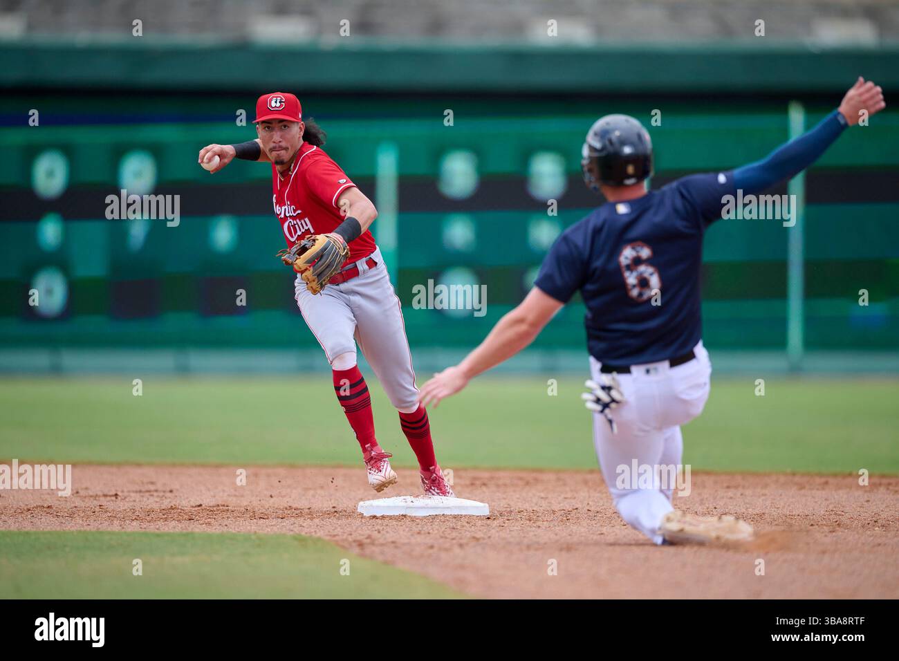 Chattanooga Lookouts shortstop Edwin Arroyo (4) turns a double play as ...