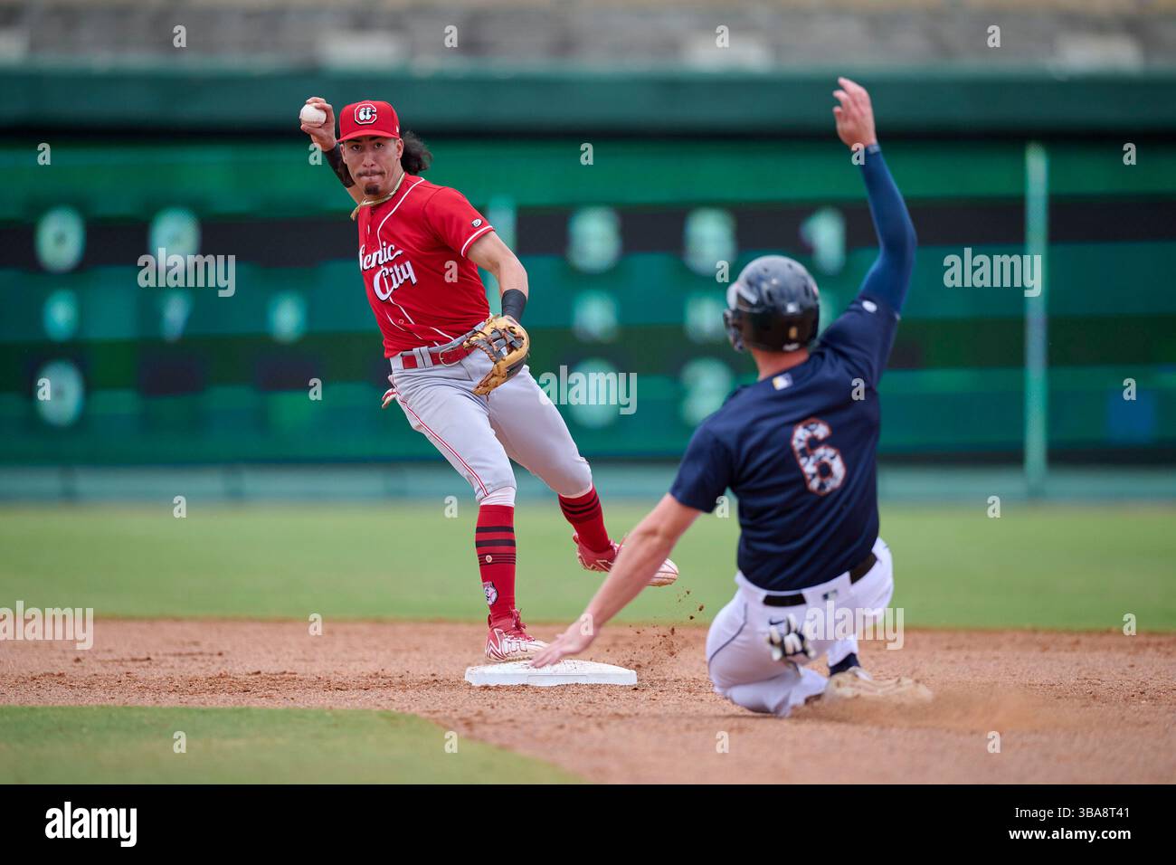 Chattanooga Lookouts shortstop Edwin Arroyo (4) turns a double play as ...