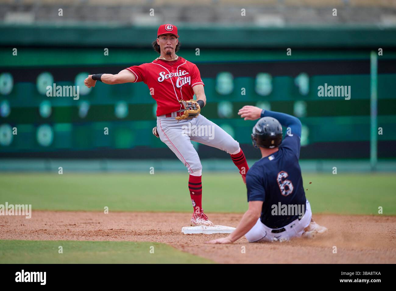 Chattanooga Lookouts shortstop Edwin Arroyo (4) turns a double play as ...