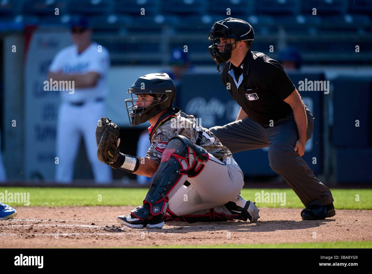 Umpire Justin Juska and Arkansas Travelers catcher Nick Raposo (15 ...