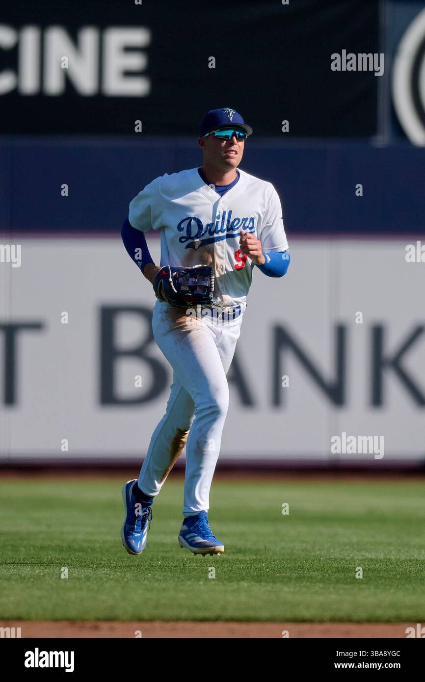 Tulsa Drillers outfielder Chris Newell (9) jogs to the dugout during an ...