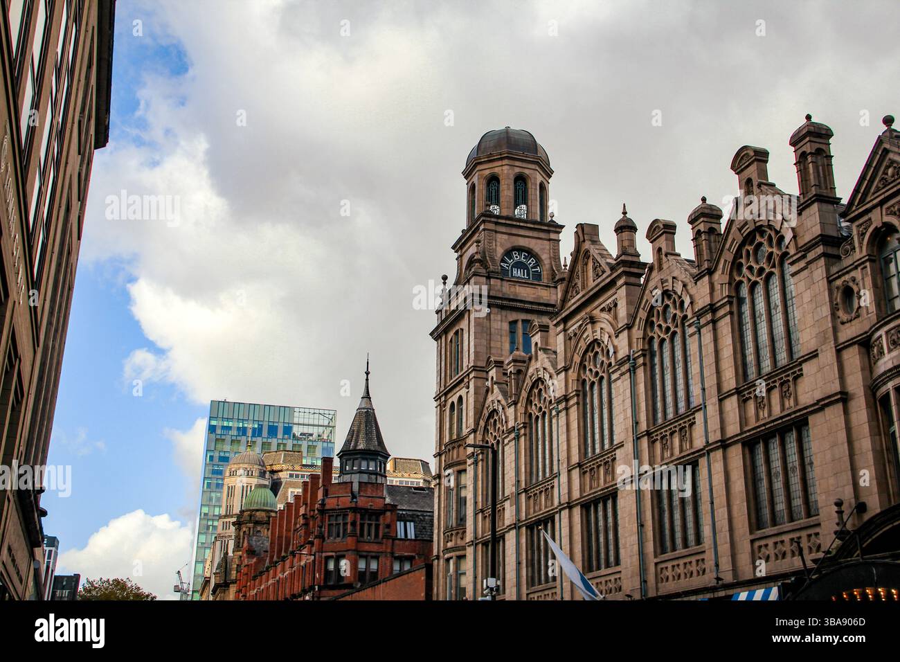 Towering neo-gothic buildings with intricate stonework and a dramatic ...