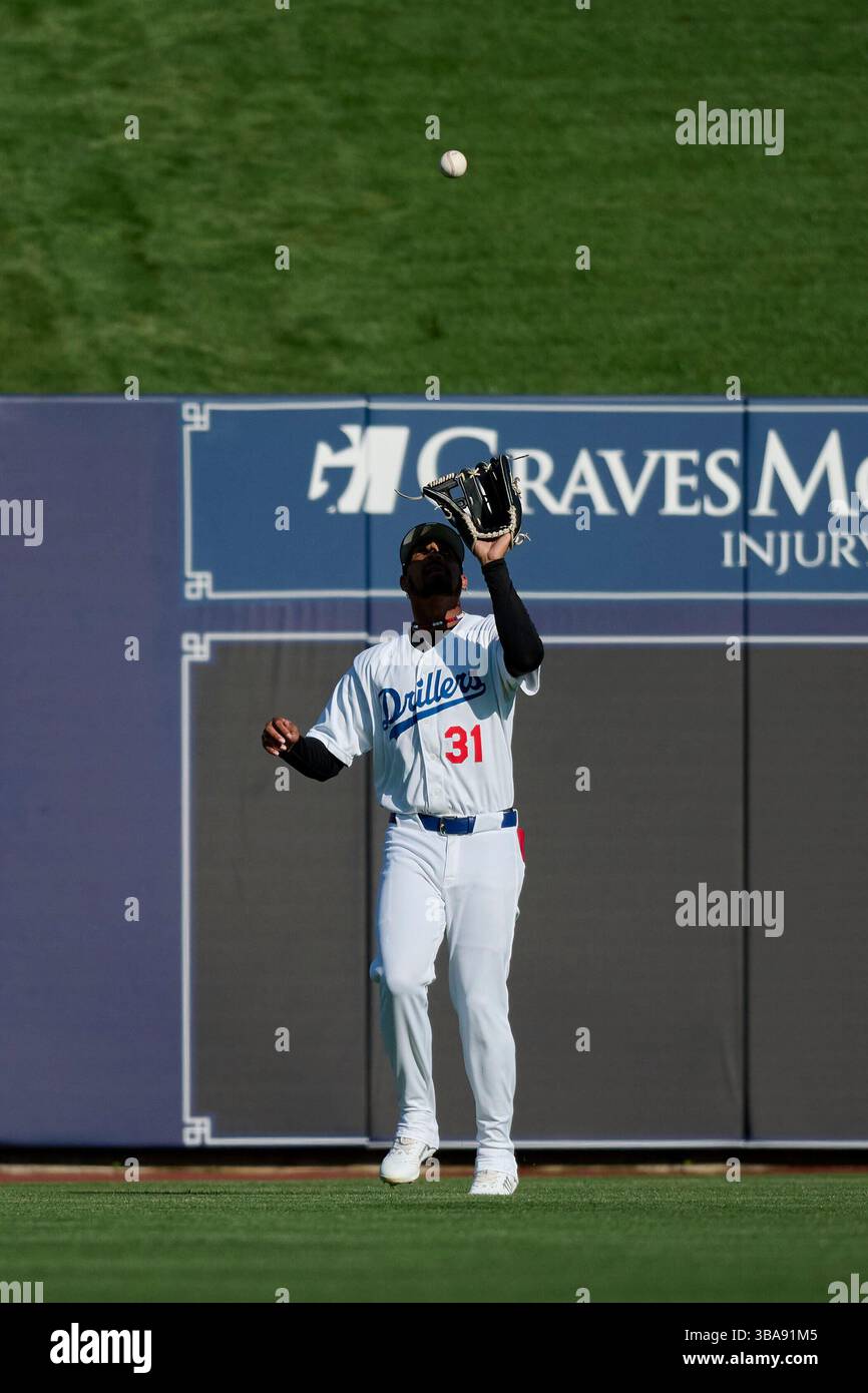 Tulsa Drillers outfielder Jose Ramos (31) catching a fly ball during an ...