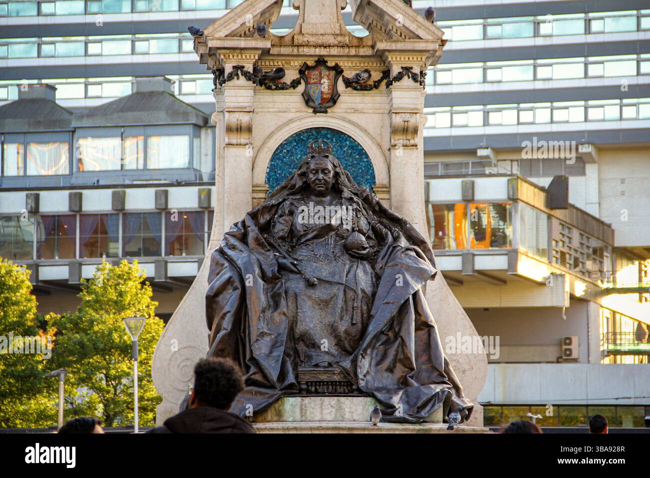 Manchester, UK - 11.16.2024: Front view of Statue of Queen Victoria outside Manchester Town Hall ...