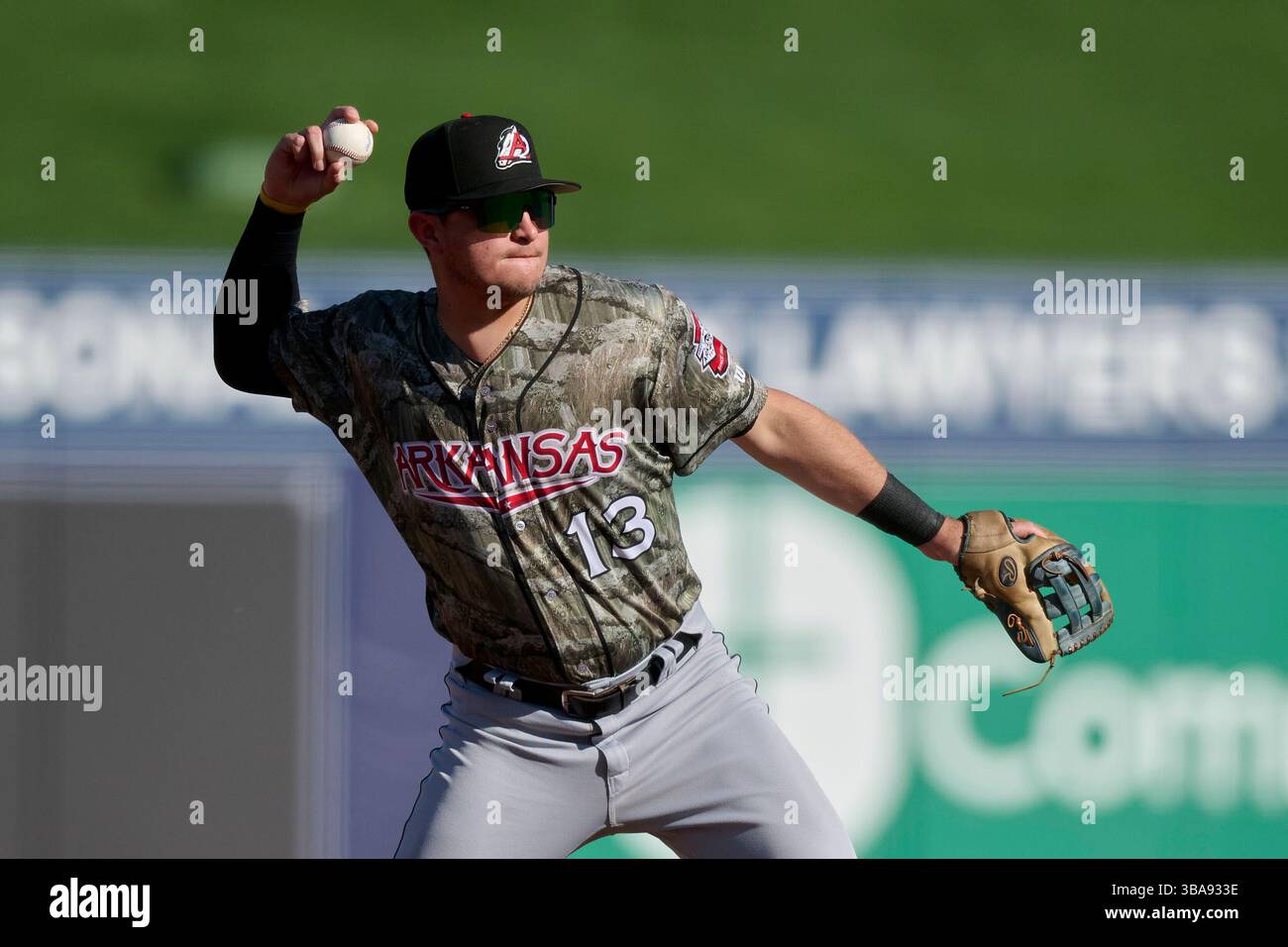 Arkansas Travelers third baseman Ben Ramirez (13) throws to first base ...