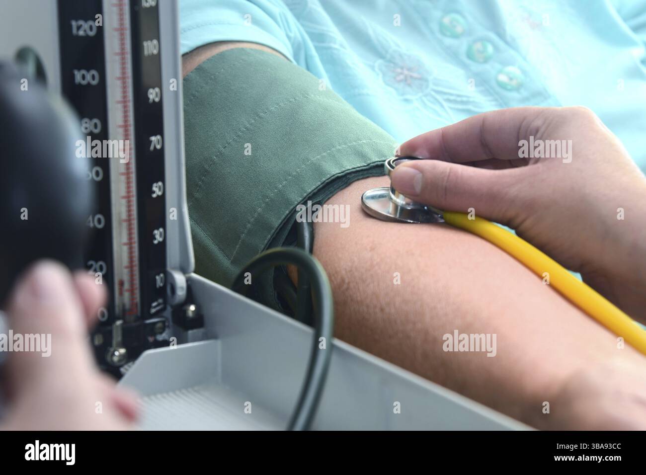 Measure blood pressure Stock Photo - Alamy