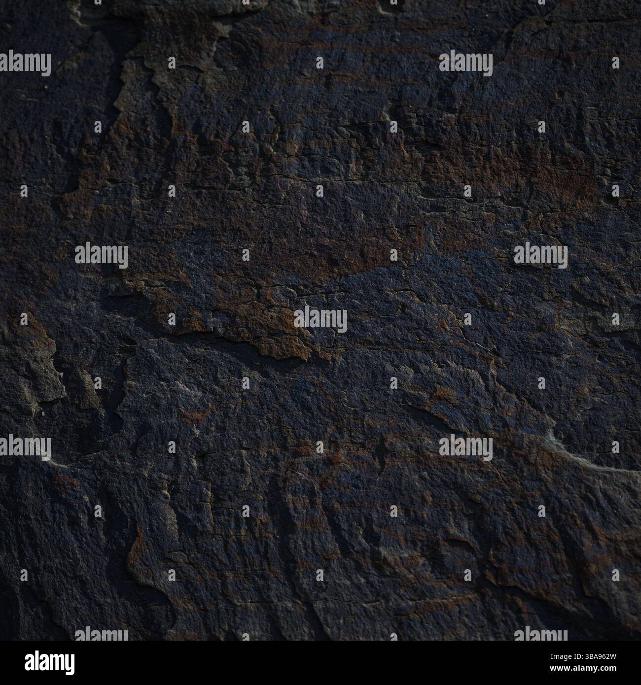 A textured stone background with a brutal, monolithic rock formation ...