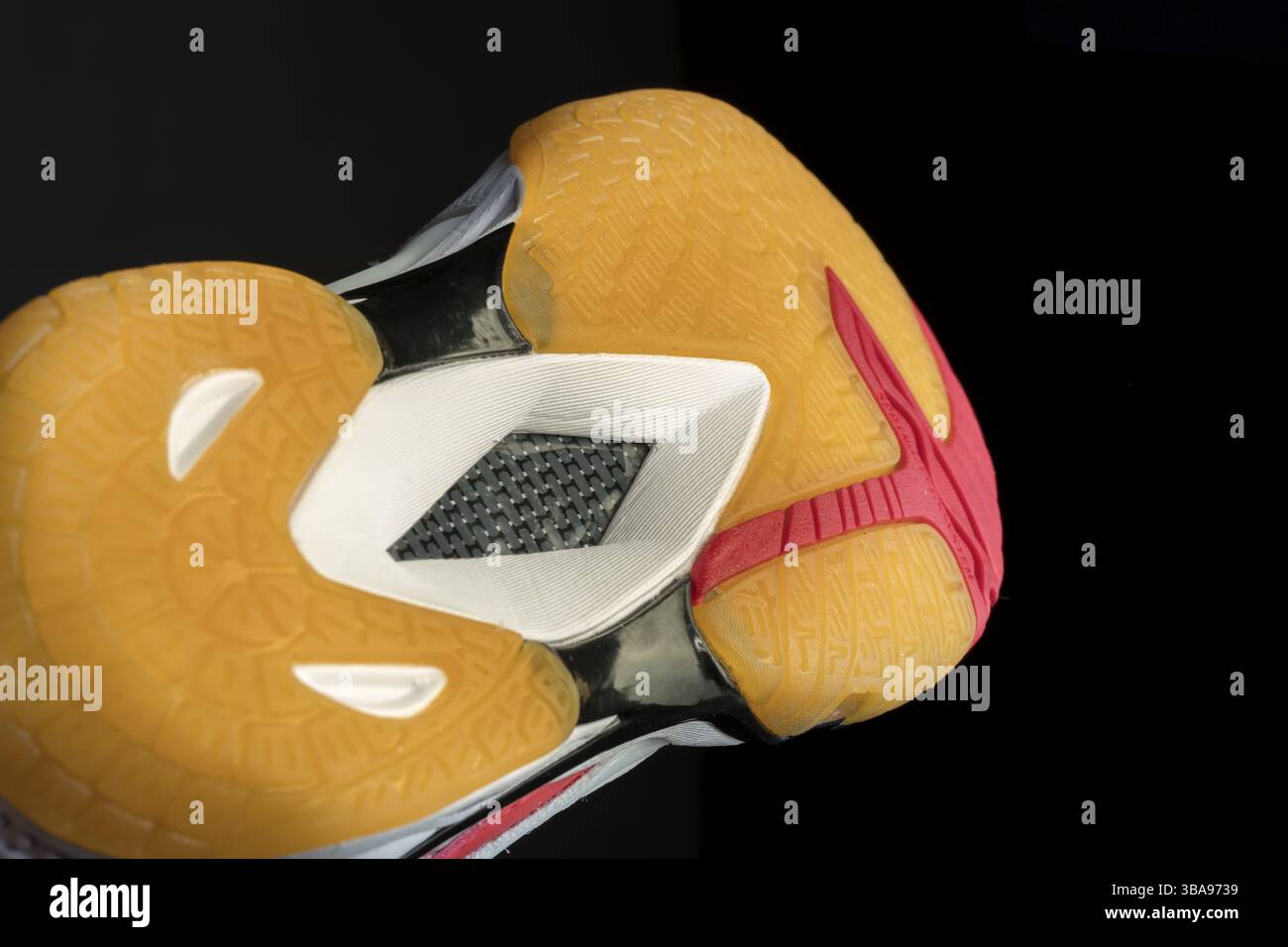 Polyurethane sole of sports shoes on a black background Stock Photo - Alamy