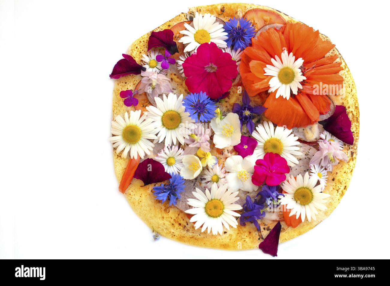 Creative pizza topped with colourful flowers Stock Photo - Alamy