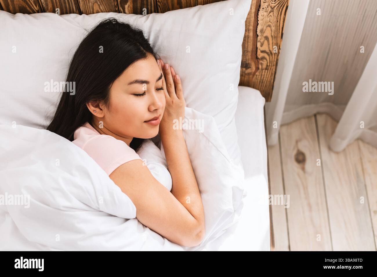 Japanese Woman Sleeping Lying In Comfortable Bed Resting In Bedroom At ...