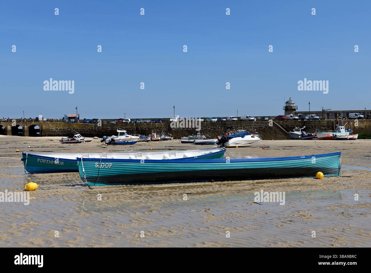 Boats beached on Sandy Beach St Ives Cornwall England uk Stock Photo ...