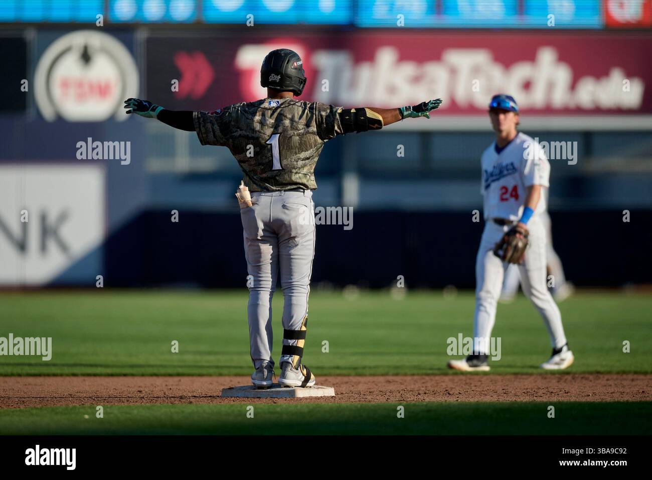 Arkansas Travelers Victor Labrada (1) celebrates hitting a double ...