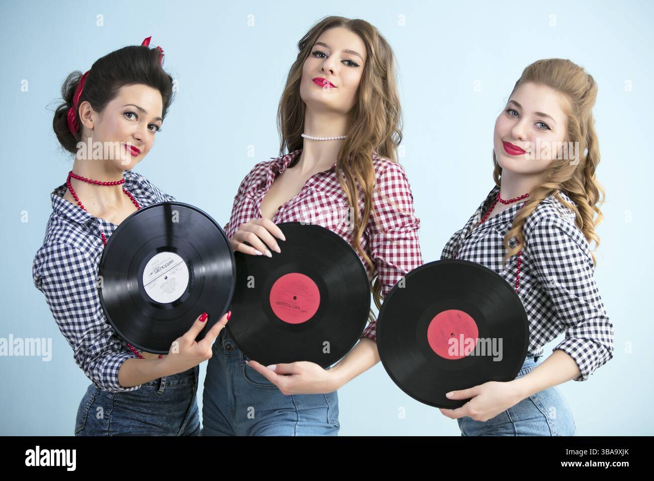 1950s women with record hi-res stock photography and images - Alamy