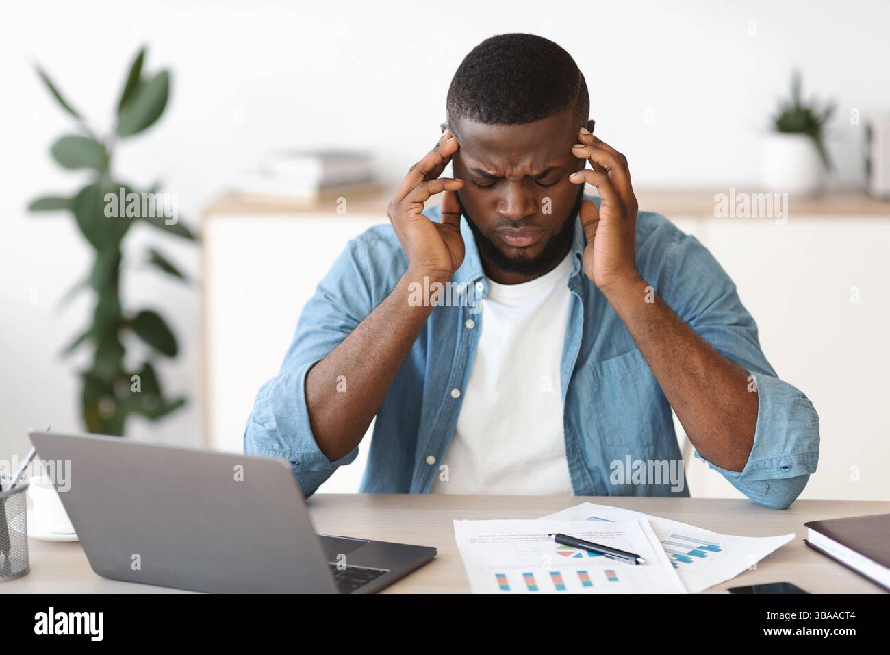 Headache Concept. Stressed Black Man Suffering From Migraine At ...