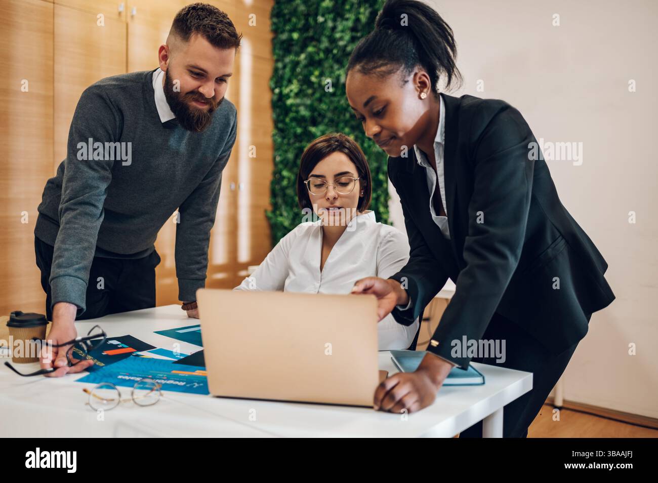 Team leader analyzing sales data statistics or explaining marketing ...