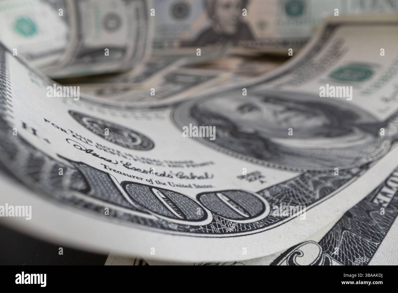 pile of US 100 dollar banknotes on spread dollar banknotes for design ...