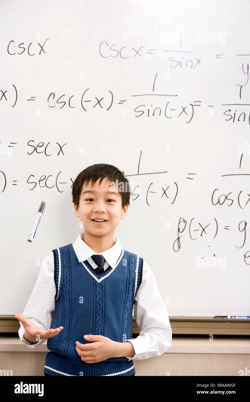 Chinese student tossing a pen up in the air Stock Photo - Alamy