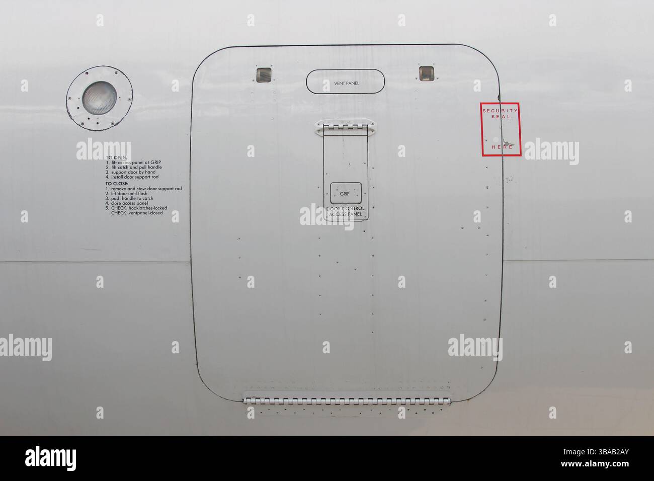 baggage compartment door of a commercial aircraft Stock Photo - Alamy
