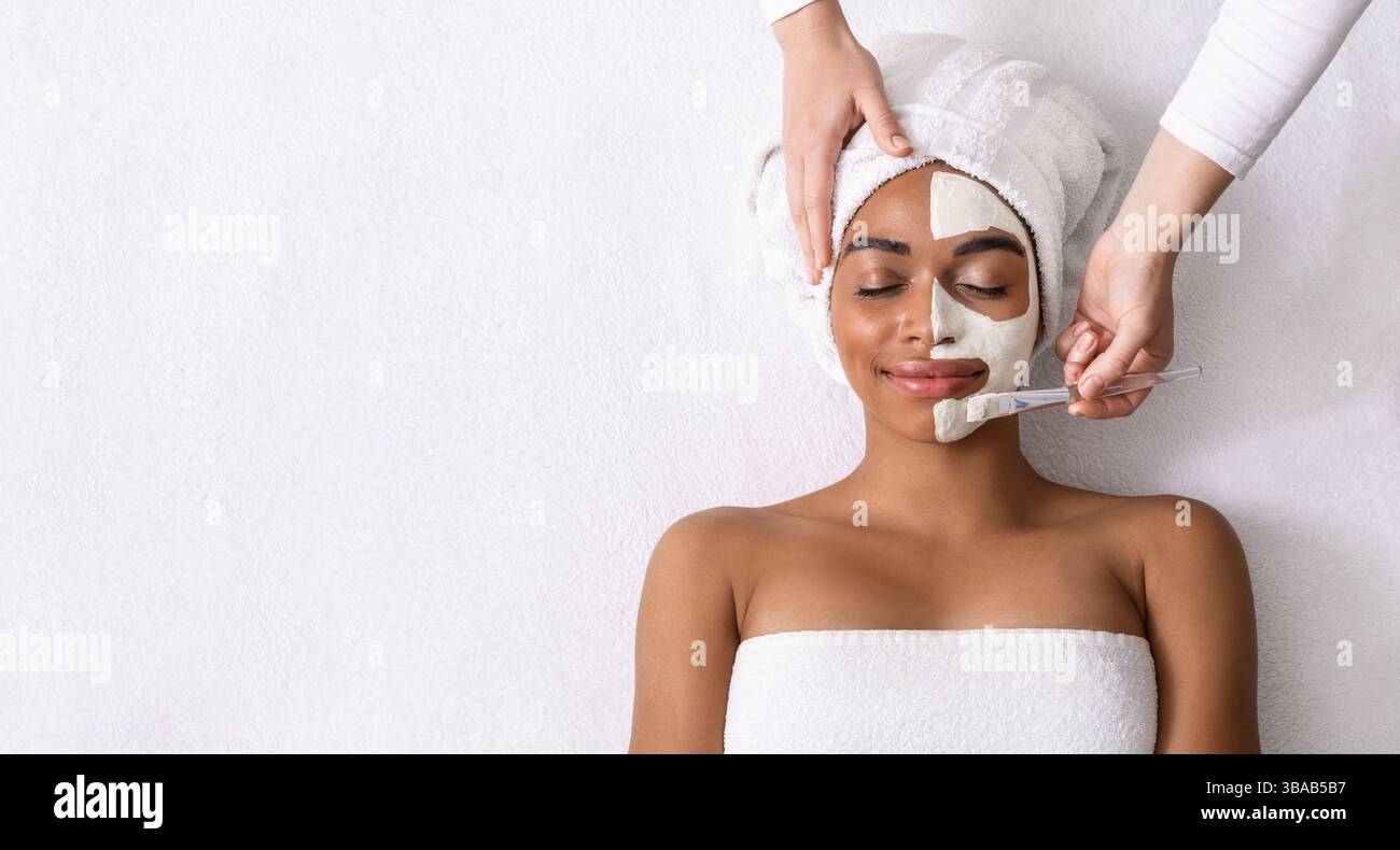 Before and after facial treatment. Beautician applying white mask on ...